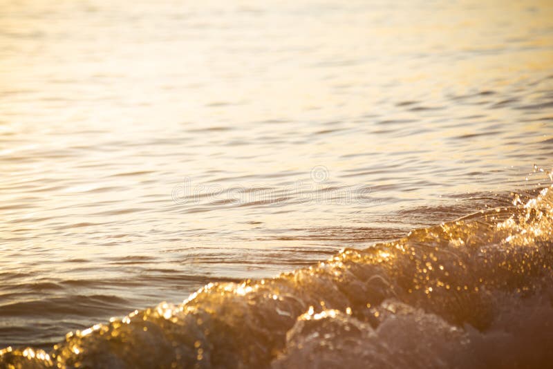 Ray of the Setting Sun on the Water with Wave, Soft Focus Stock Photo ...