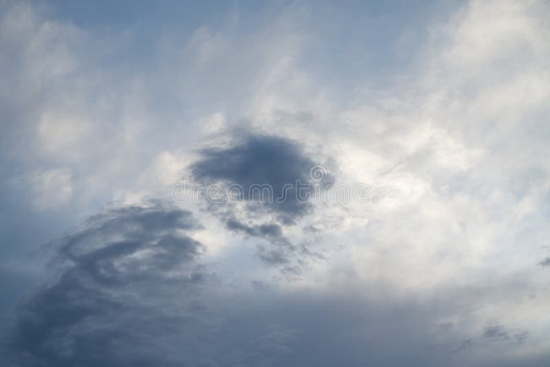 A Ray of Sun Breaks through the Clouds on a Clear Day Stock Photo ...