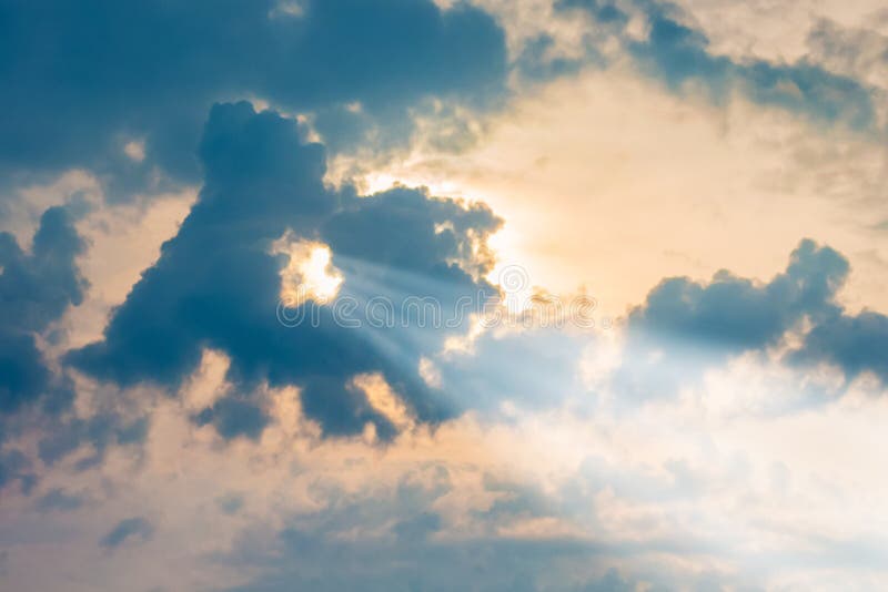 The Ray of Sun Penetrates through the Cloud in the Evening Sky. Stock ...