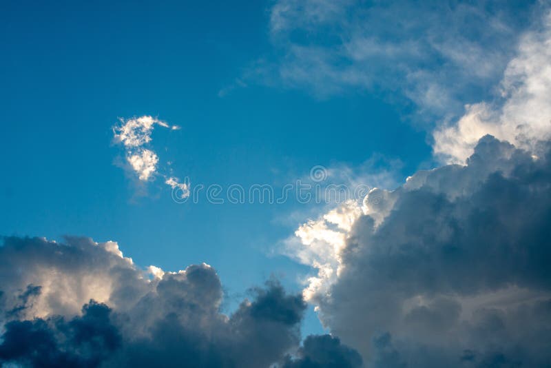 A Ray of Sunlight Shines through the Storm Clouds Stock Photo - Image ...