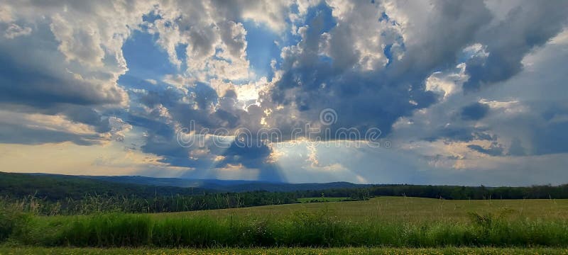 Ray of sunshine stock photo. Image of dawn, meadow, plain - 233534750