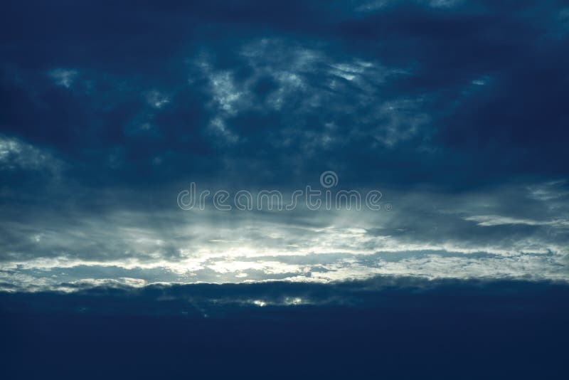 Rays in dark clouds stock photo. Image of scene, ominous - 240614952