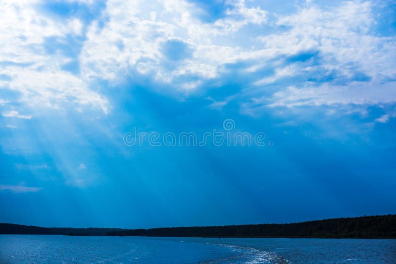 The Rays of God in the River Landscape. the Sun S Rays Shine through ...