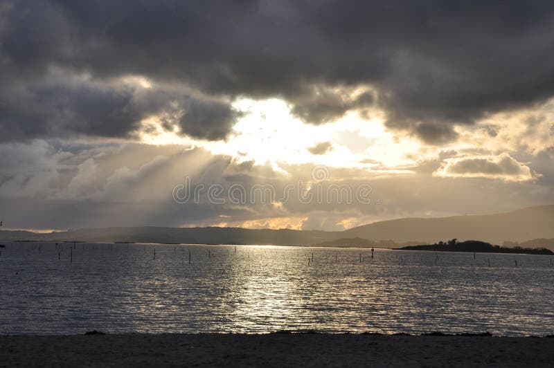 Rays of Light Breaking through Stormy Clouds Stock Photo - Image of ...