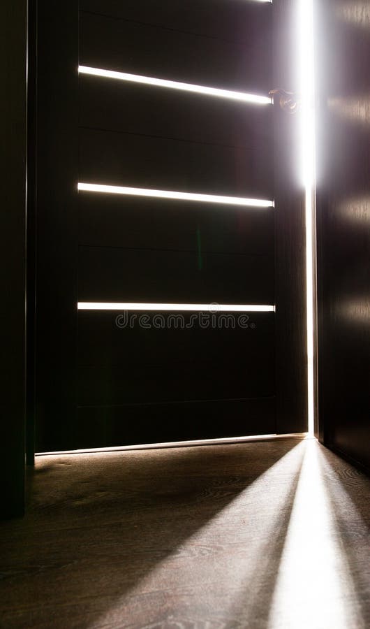 Rays of Light from the Door in a Dark Room Stock Image - Image of light ...