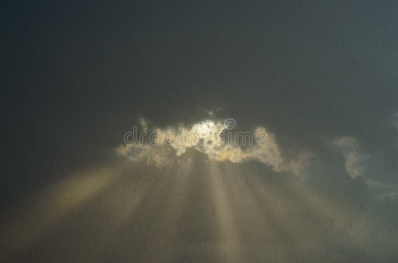 Rays of light in grey sky stock image. Image of beam - 157908071