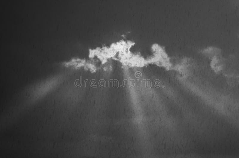 Rays of light in grey sky stock image. Image of beam - 157908071
