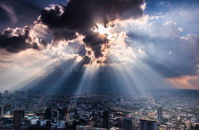 Rays of Light Shining through Dark Clouds Stock Photo - Image of city ...