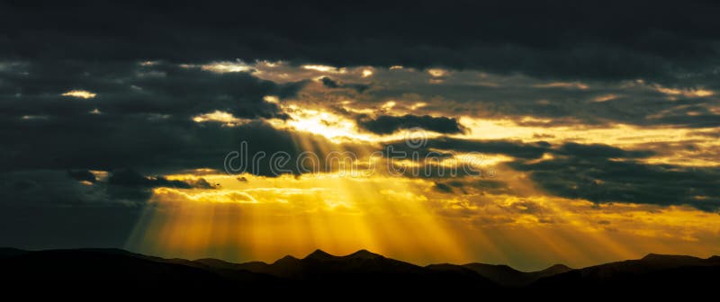 Rays of Light Shining through Stormy Clouds and Covering Dramatic ...