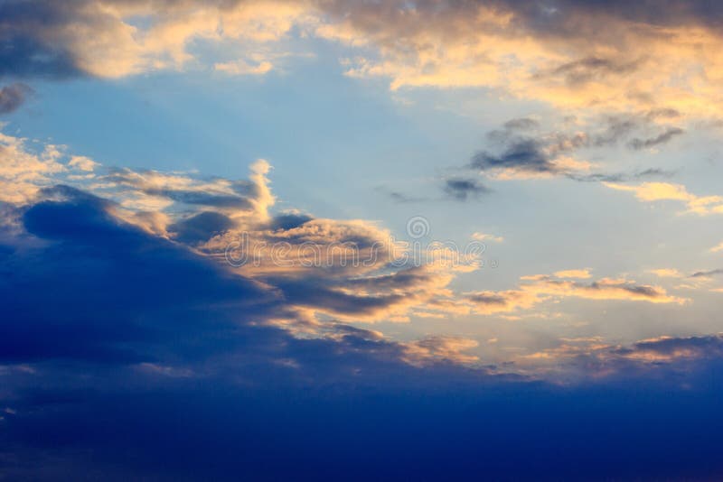 The Rays of the Sun Break through the Clouds on a Spring Evening ...