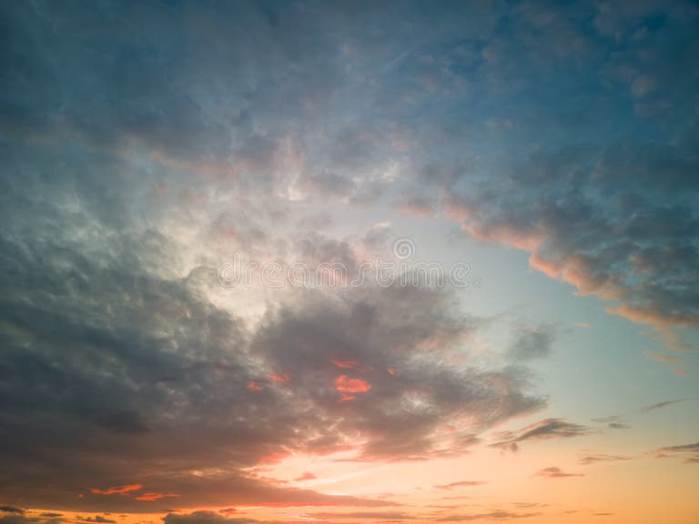The Rays of the Sun Breaking through the Dramatic Clouds in the Evening ...