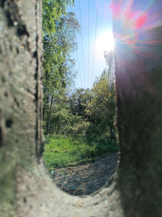 Rays of the Sun Falling through a Concrete Hole. Stock Image - Image of ...