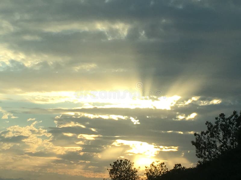 Sun Peeking Clouds Stock Photos - Download 483 Royalty Free Photos