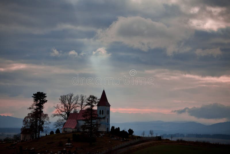 Rays of the Sun Pointing To Church on the Horizon. Stock Image - Image ...