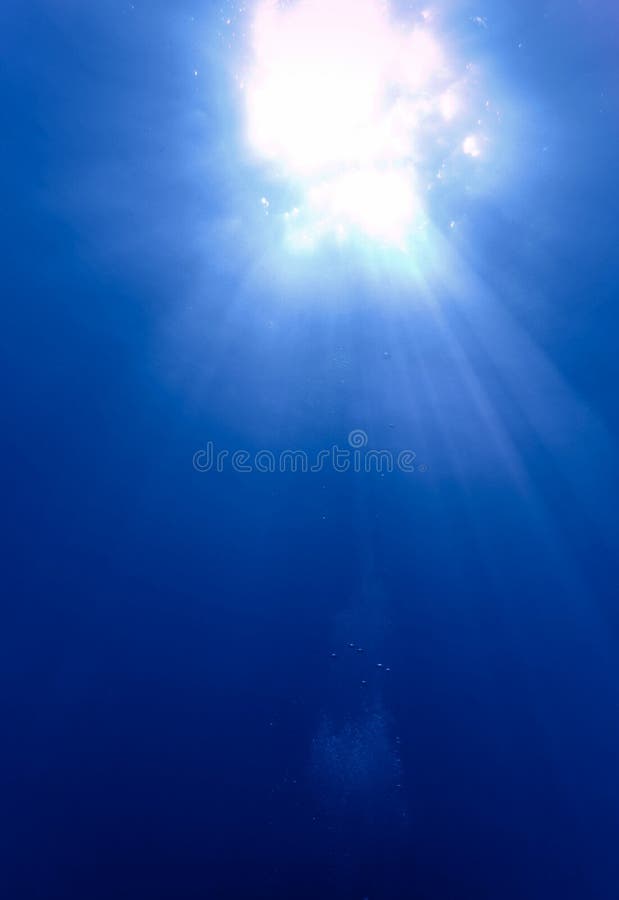 Rays of Sunlight in the Deep Blue Sea Stock Photo - Image of deep ...