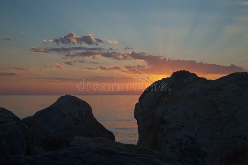 Rays of Sunshine at the Seaside Stock Image - Image of sunset, cloud ...