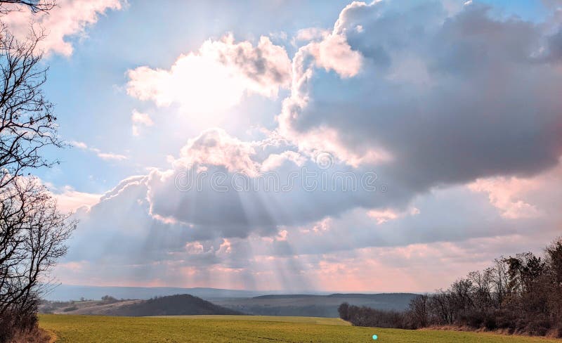 Rays of Sunshine after the Storm Stock Photo - Image of cumulus, plain ...