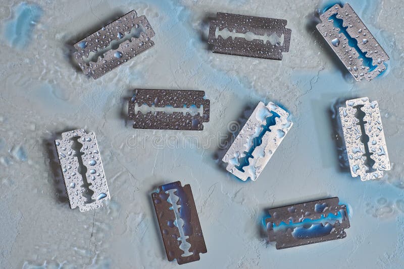 Razor blades on the table stock photo. Image of beard - 228345310