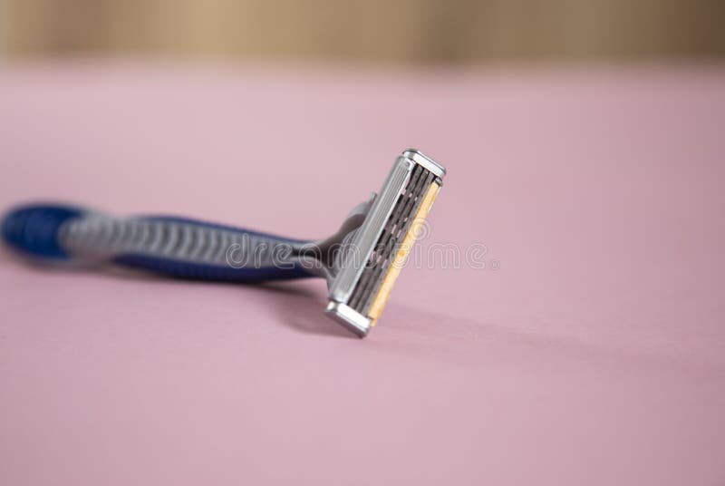 Razor on pink background stock photo. Image of background - 228376182