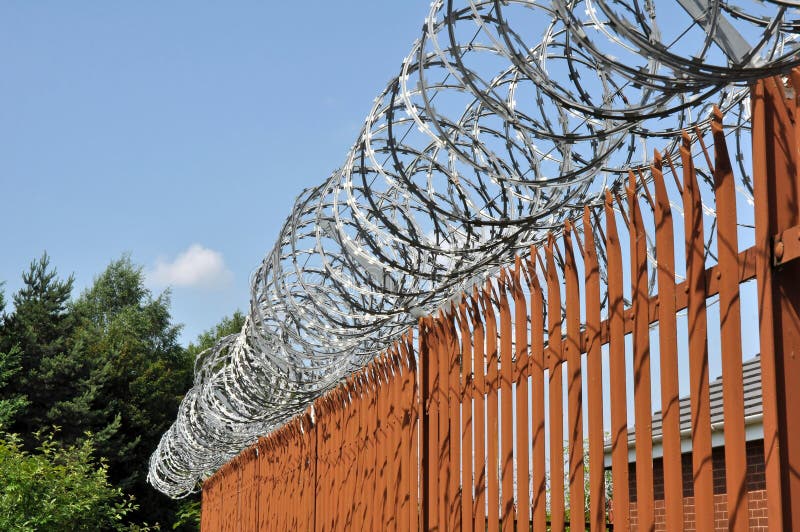 Razor Wire Fence stock photo. Image of defensive, protection - 32674058