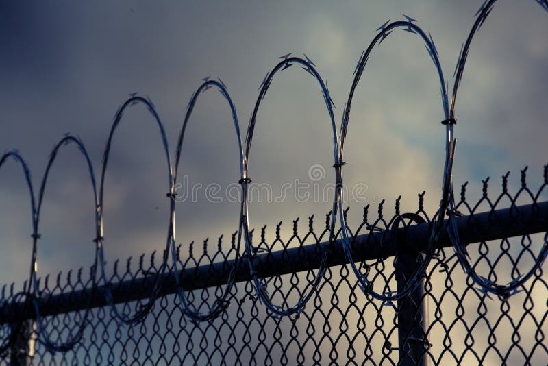 Razor Wire on a Prison Fence Stock Image - Image of wire, razor: 24348411