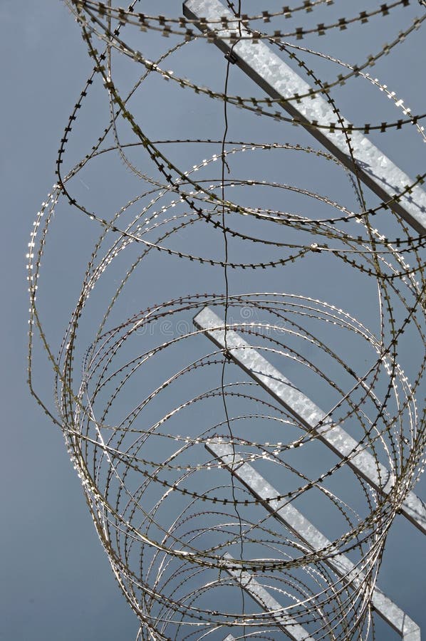 Razor wire on prison fence stock image. Image of flee - 62851669