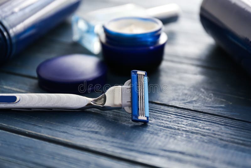Razor on wooden table stock photo. Image of barber, hair - 151301038