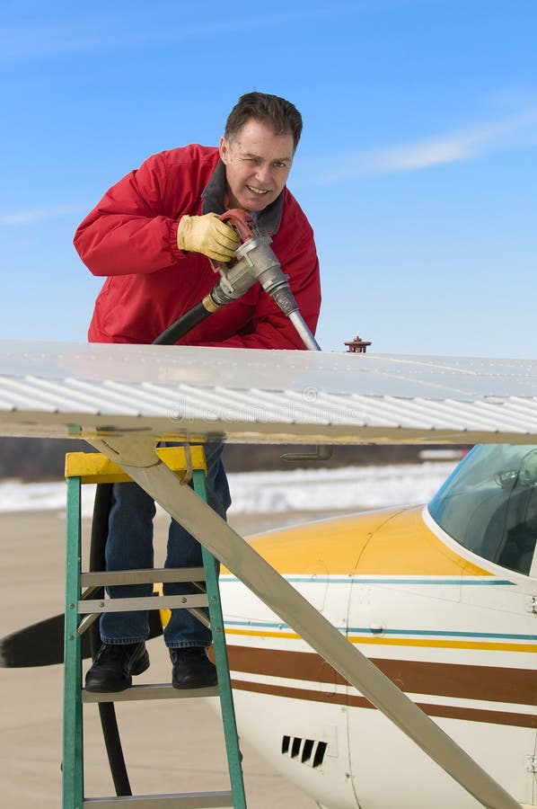 Re-fueling Airplane stock photo. Image of airplane, ladder - 13383734