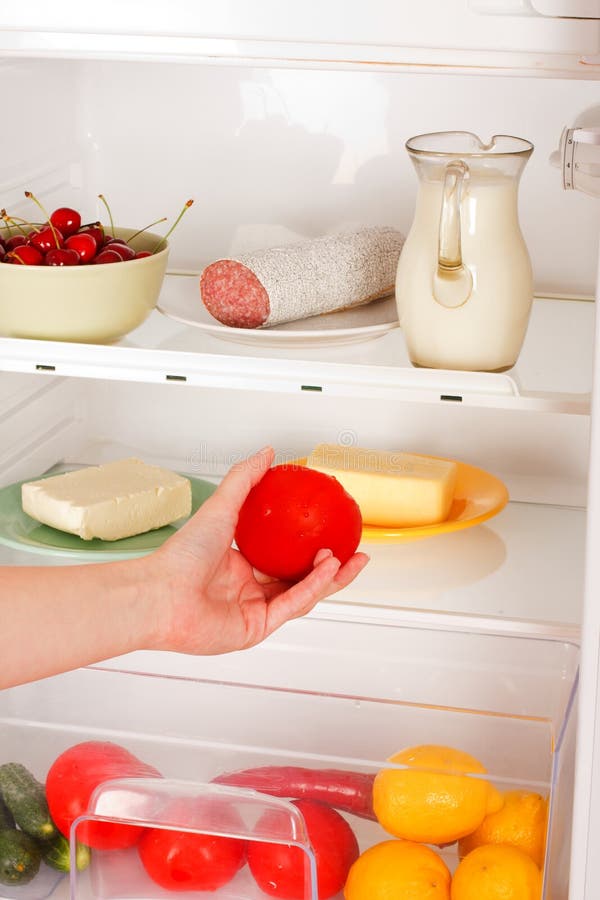 Reaching for food stock image. Image of home, tomato - 16595105