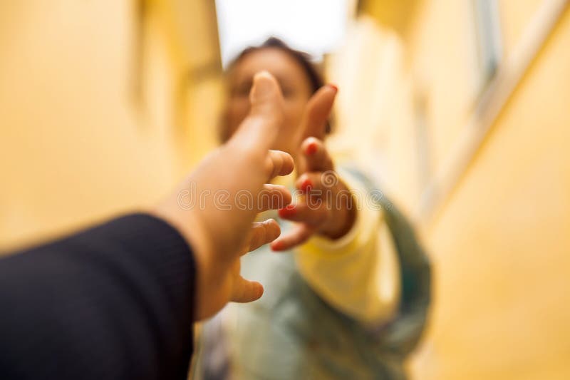 Reaching Hands in Motion Symbolizing Connection and Support in a ...