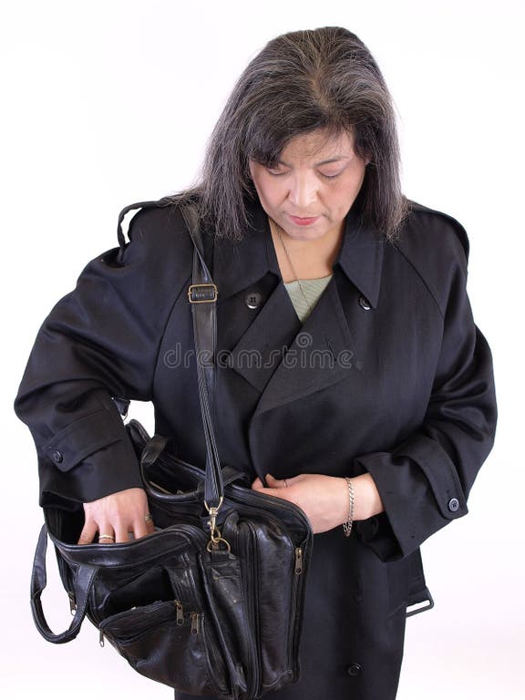Reaching into Her Briefcase Stock Photo - Image of hispanic, black ...