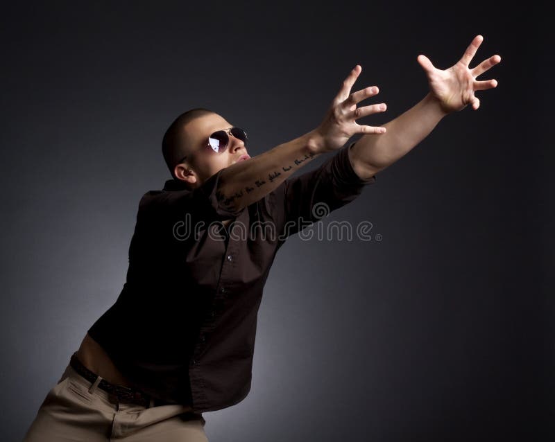 Artistic Pose Of A Dramatic Fashion Young Man With Beard Stock Image ...