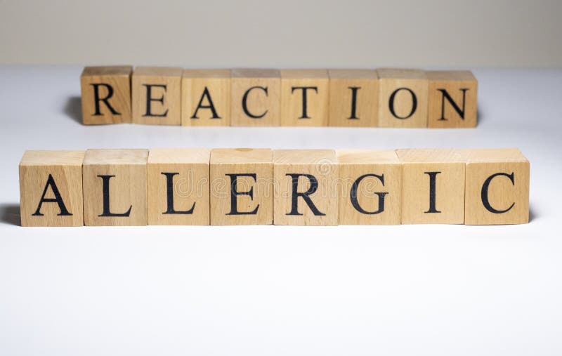 Reaction Word in Wooden Cube. Close Up. Stock Photo - Image of allergic ...
