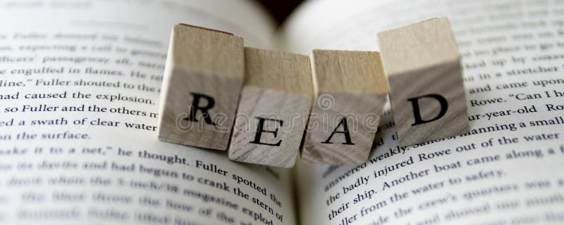 Read in Block Letter on an Open Book Stock Photo - Image of fiction ...