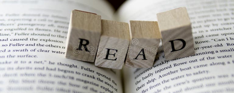 Read in Block Letter on an Open Book Stock Photo - Image of fiction ...
