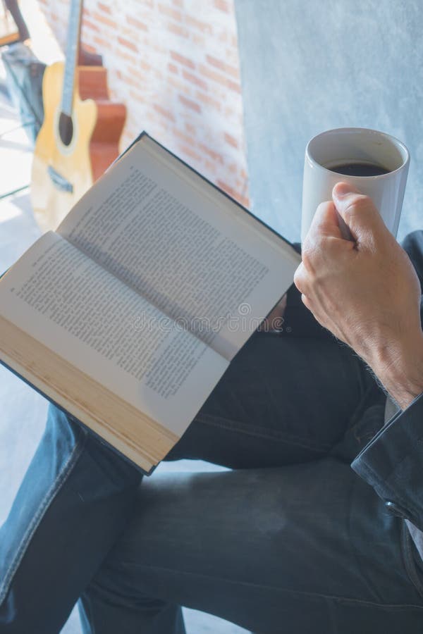 Read a book, enjoy stock image. Image of enjoyment, pillow - 93525525