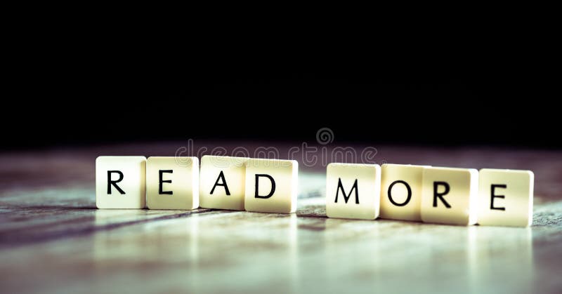 Read More Word Made of Tiles on Dark Wooden Background Stock Photo ...