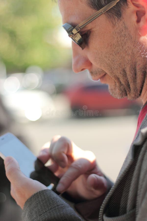 Read sms on smartphone stock image. Image of bokeh, mobile - 70673887