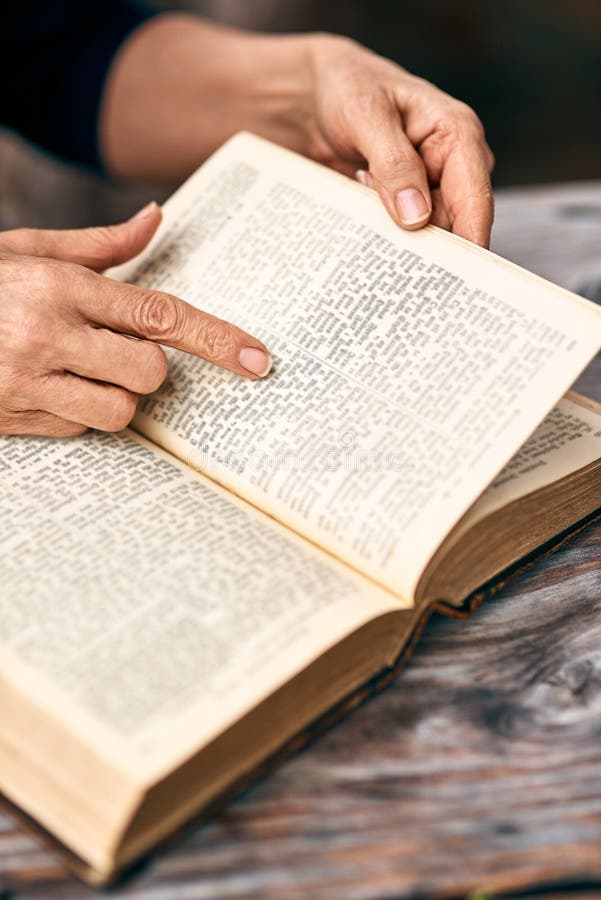 Read Something Worth Reading. an Unrecognizable Woman Reading a Book ...