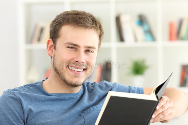 Reader Reading Book and Looking at Camera Stock Image - Image of ...