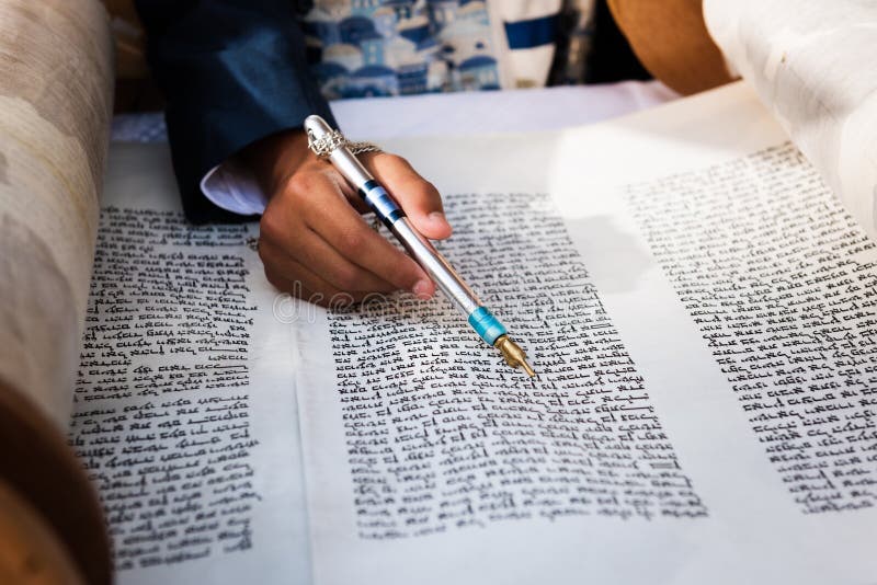 A Reader of the Torah Uses a Yad or Pointer As a Guide Stock Image ...