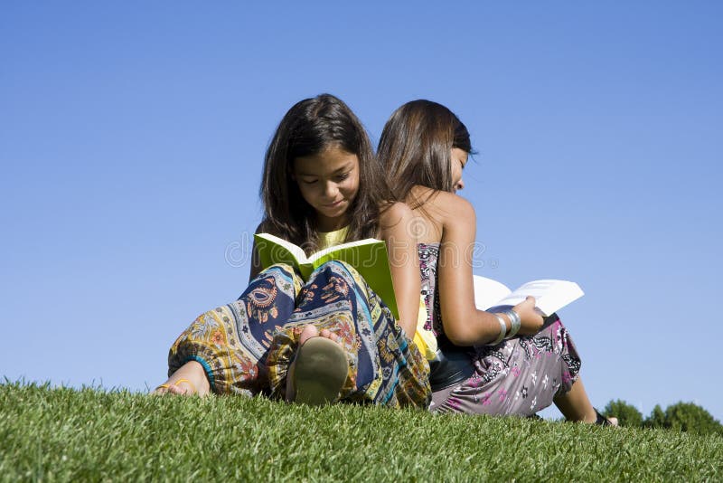 Kids Reading Outside stock photo. Image of female, child - 7255158