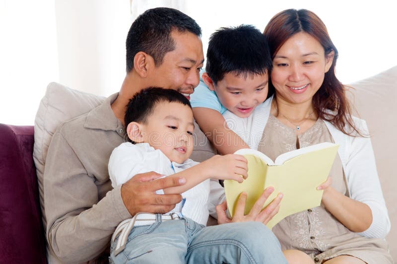 Asian family reading stock image. Image of elder, mother - 31571031