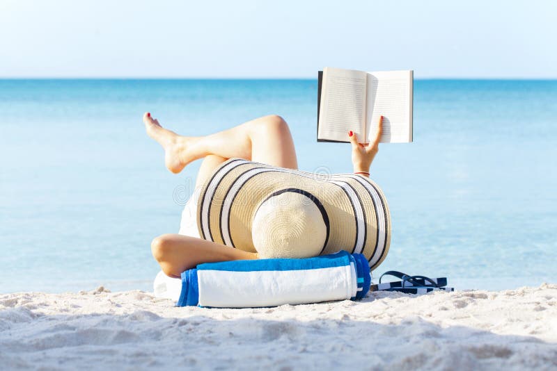 Reading on Beach stock photo. Image of destinations - 151518574