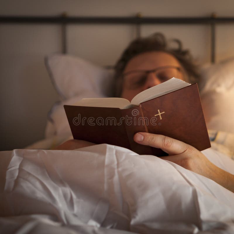 Reading the Bible stock photo. Image of comfortable, night - 87304350