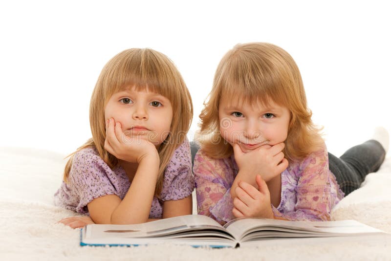 Reading a Book on the Carpet at Home Stock Photo - Image of imagine ...