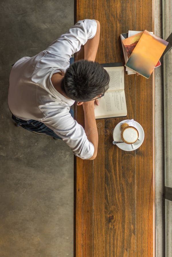 Reading Book and Drinking Coffee at the Cafe Stock Photo - Image of ...