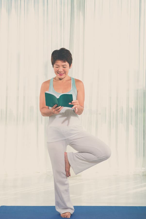 Reading a book stock photo. Image of hobby, active, barefoot - 43960108