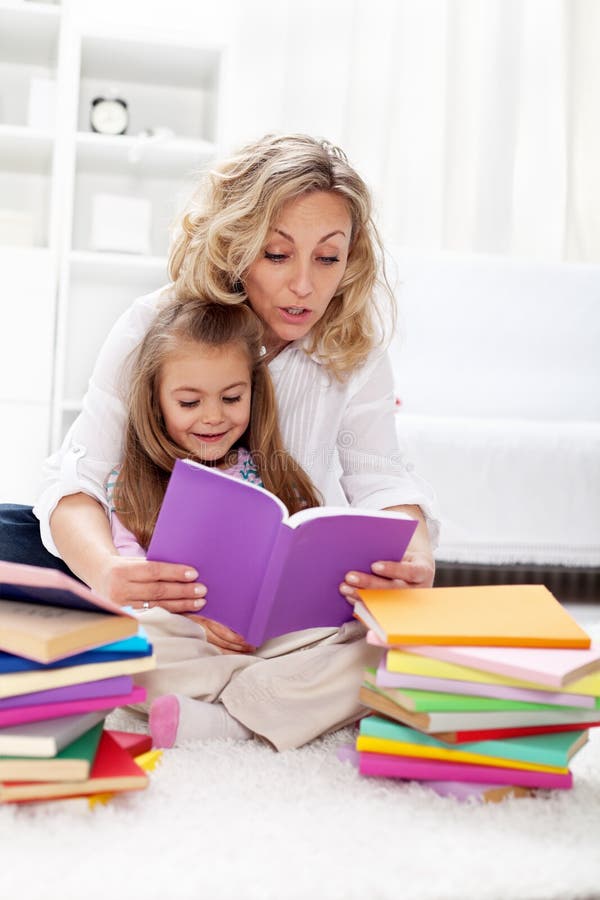 Reading a book with mom stock image. Image of lifestyle - 22312809