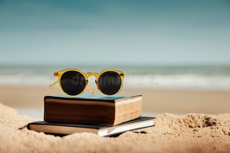 Reading Book Outdoor In Summer Concept Book And Sunglasses On The